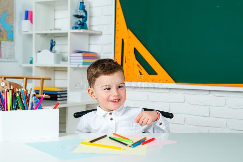 A Preschool Boy Studies and Passes Labyrinths on a White Background ...
