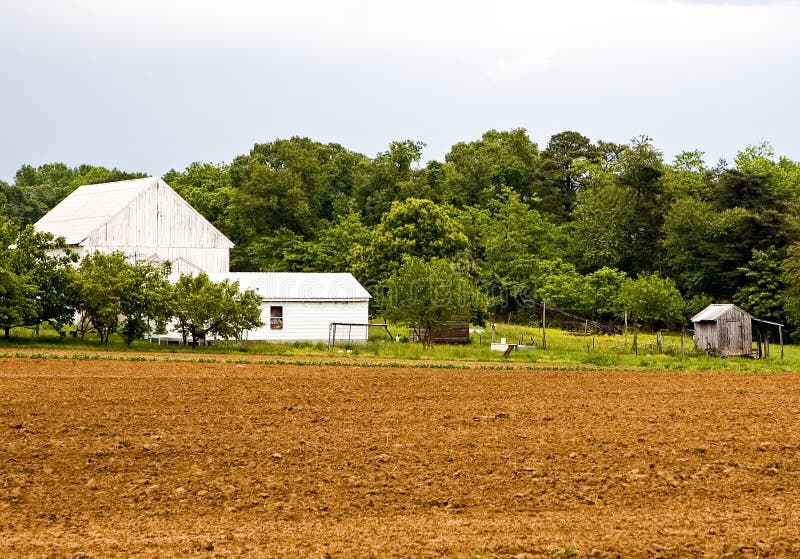Homestead with Plowed Field Stock Photo - Image of ready, harrowed: 1067264