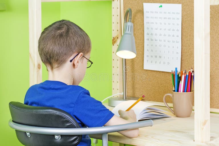 7 Years Old Boy Doing His Homework Education Stock Photos - Free ...