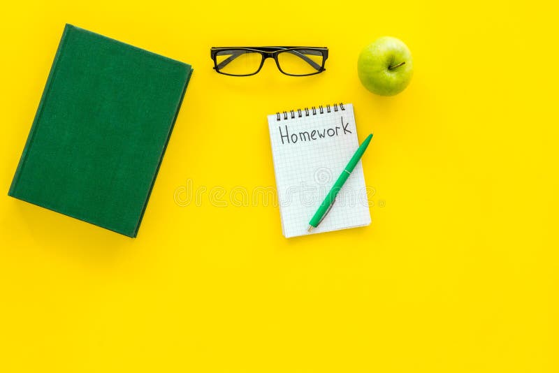 Homework Concept. Word Homework Written in Notebook on Yellow Desk with ...