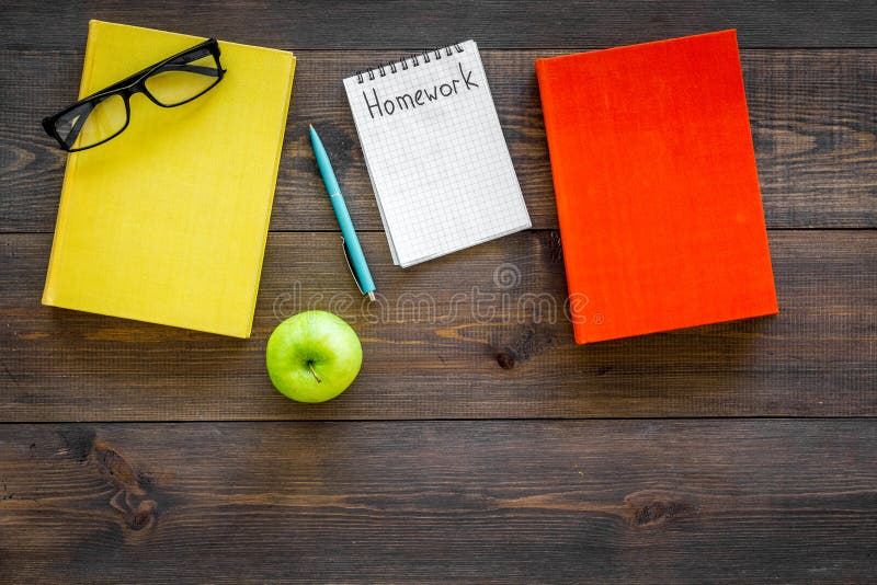 Homework Concept. Word Homework Written in Notebook on Dark Wooden Desk ...