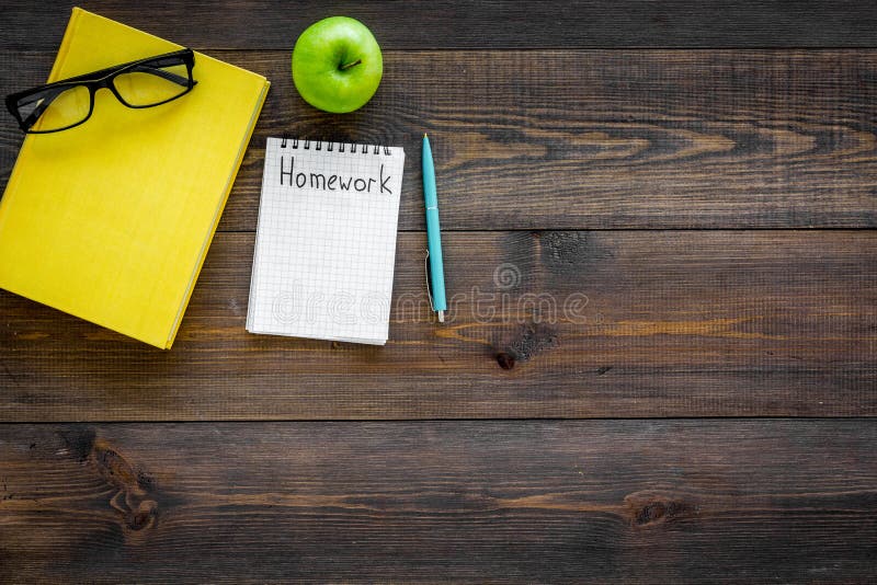 Homework Concept. Word Homework Written in Notebook on Dark Wooden Desk ...