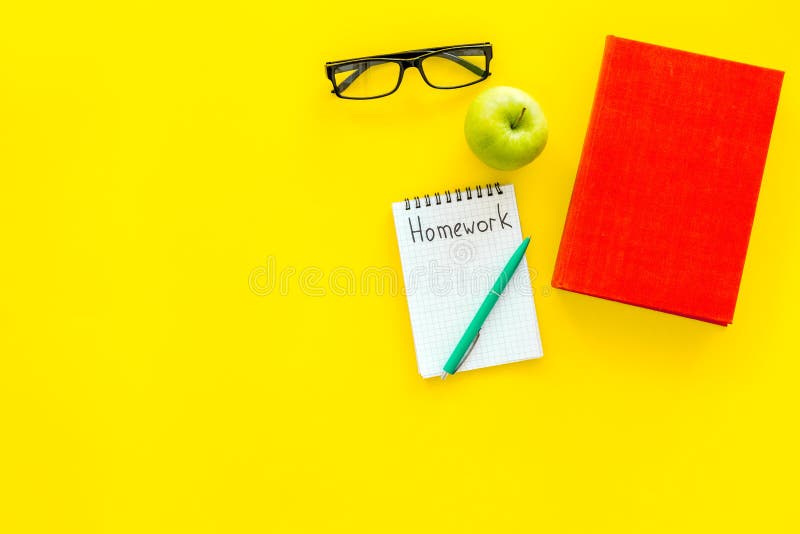 Homework Concept. Word Homework Written in Notebook on Yellow Desk with ...