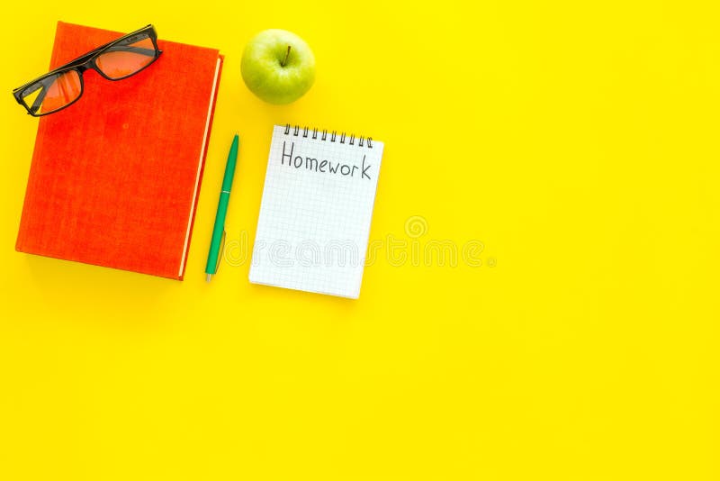 Homework Concept. Word Homework Written in Notebook on Yellow Desk with ...