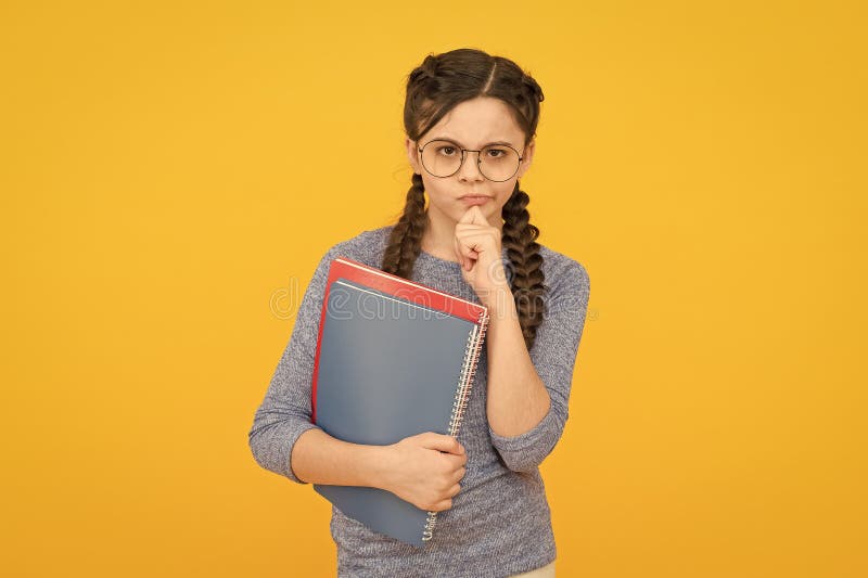 Homework Develops Study Habits. Serious Girl Hold Books. Thinking on ...