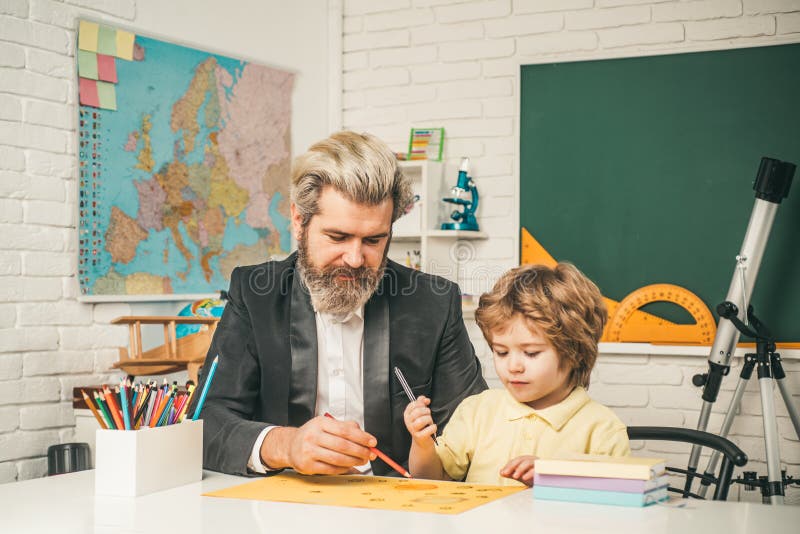 Homework Help. Father Helping His Son To Make Homework. Elementary ...