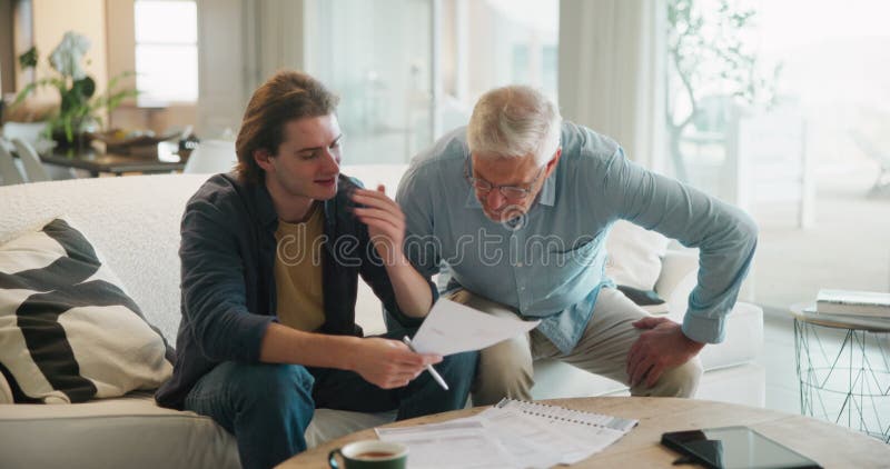 Homework, Senior Man and Teaching College Student on Sofa with Exam and ...