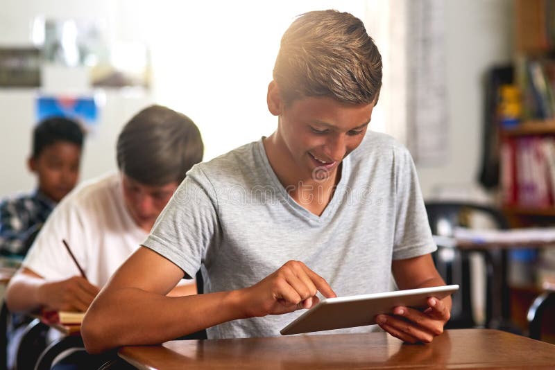 Homework Theres an App for that. a Young Schoolboy Using a Tablet at ...