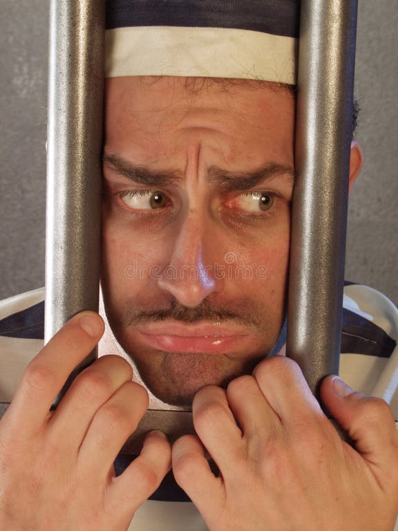 Homme coupable en prison. image stock. Image du fureur - 20719563