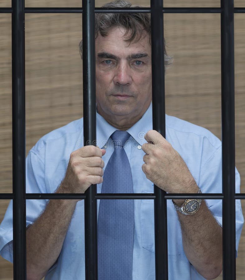 Homme en prison image stock. Image du crime, verrouillé - 24394121