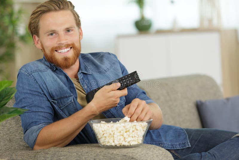Homsmiling Man with Tv Remote Control at Home Stock Image - Image of ...