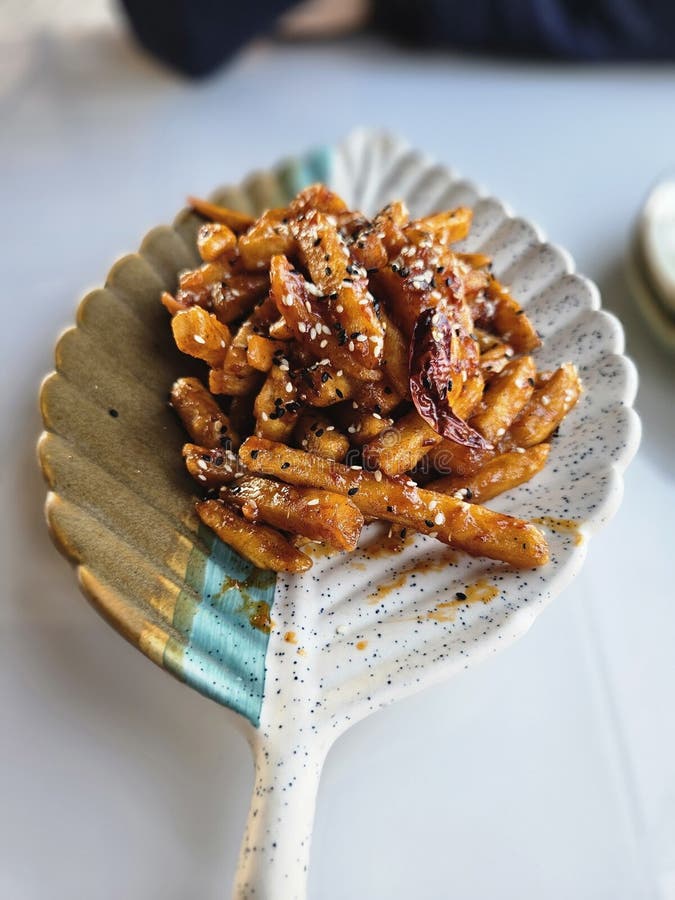 Honey Chilli Potatoes stock photo. Image of cafe, honey - 358090732