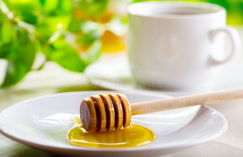 Honey and cup of tea stock photo. Image of drink, drizzler - 30685786