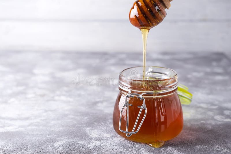 Honey Drip in Jar on the Table Stock Image - Image of liquid, isolated ...