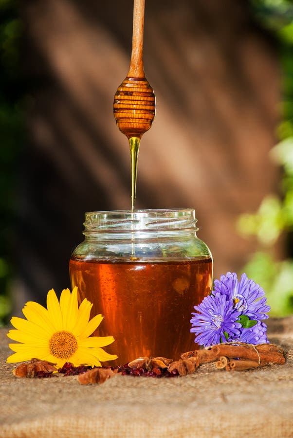 Honey Drip in Jar on the Table Stock Photo - Image of drizzler, flow ...