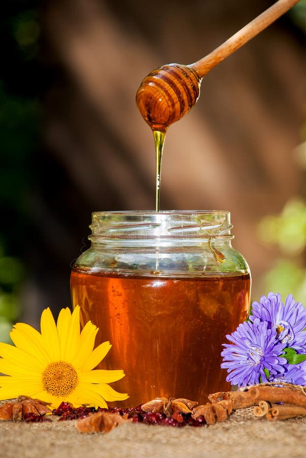 Honey Drip in Jar on the Table Stock Photo - Image of foodingredient ...