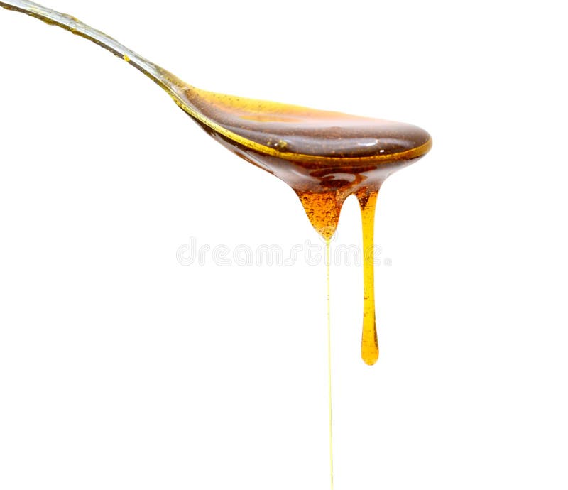 Honey falling on a spoon. stock photo. Image of pouring - 185755526