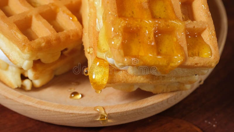 Honey Flowing on Waffles and Dripping from it Stock Video - Video of ...