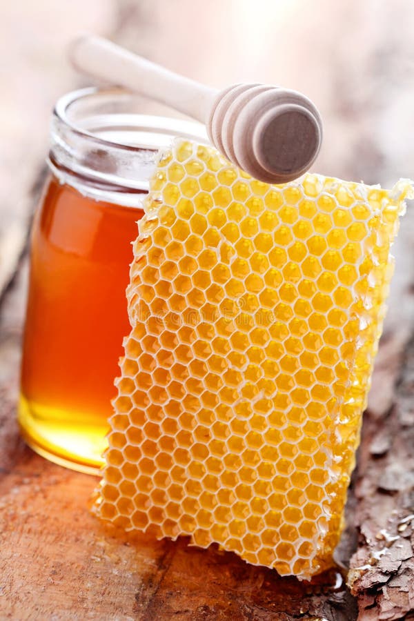 Honey with honey comb stock image. Image of color, liquid - 55130943