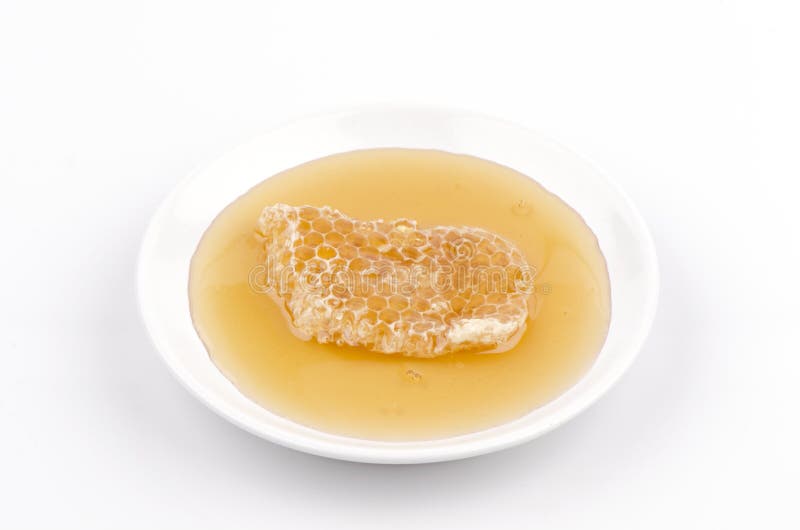 Honey and the Honeycomb.(Apis Spp) Stock Photo - Image of honeycomb ...