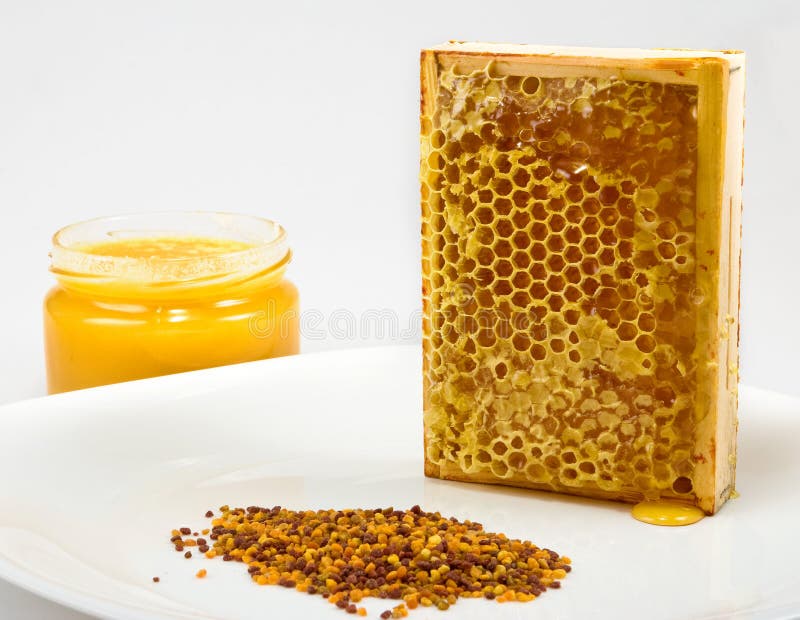 Honey, Honeycomb and Pollen on a Plate Stock Photo - Image of food ...