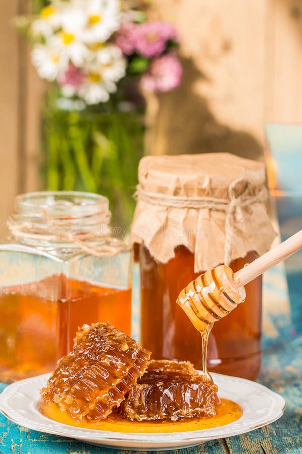 Honey in a Pot or Jar on Kitchen Table Stock Image - Image of flow ...