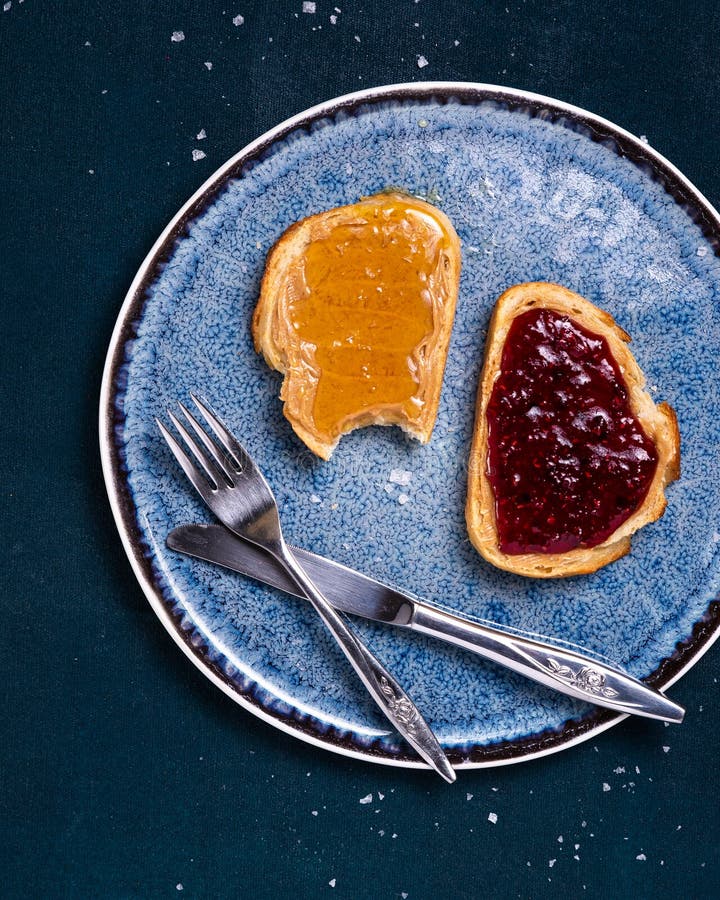 Honey, Raspberry Jam and Peanut Butter on White Toast Stock Image ...