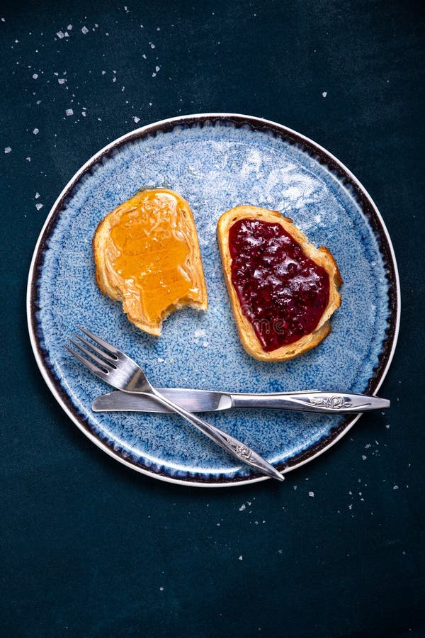 Honey, Raspberry Jam and Peanut Butter on White Toast Stock Image ...