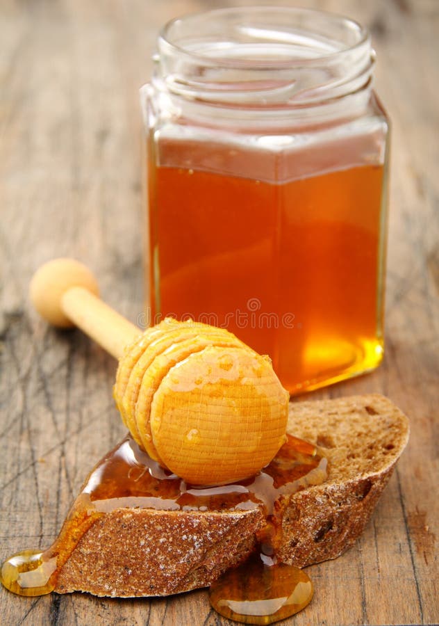 Honey and rye bread. stock photo. Image of liquid, nutrition - 22527084
