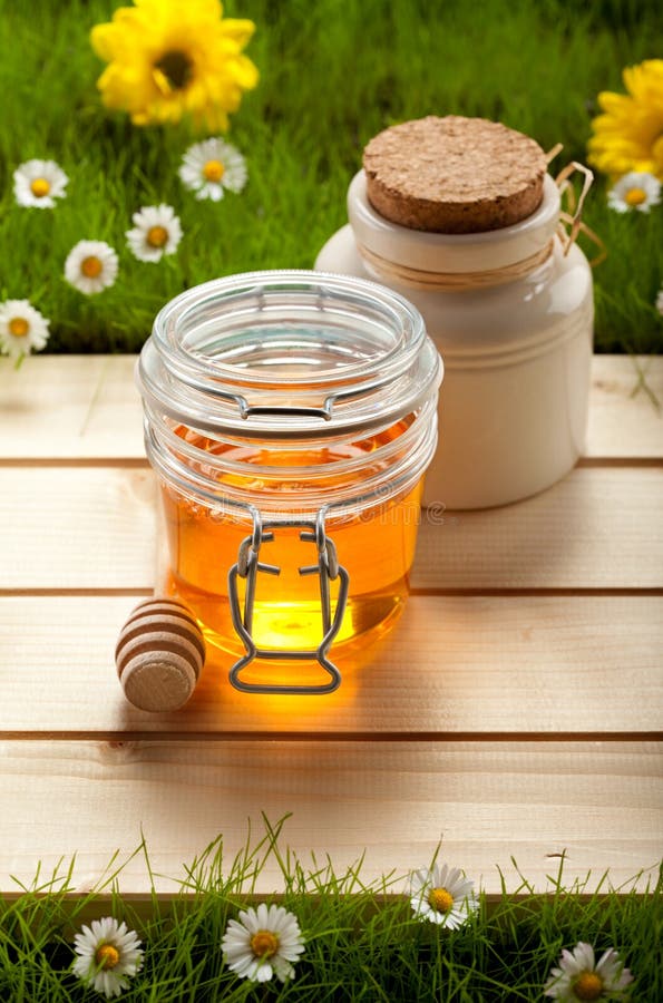 Honey and spring flowers stock photo. Image of beam, blue - 19651886