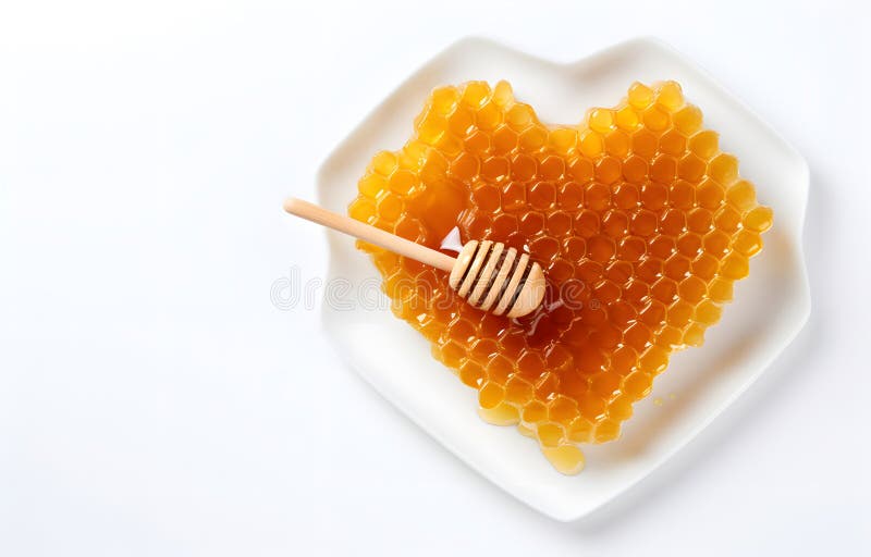 Honeycomb Heart Shape with Liquid Honey on White Plate Isolated on ...
