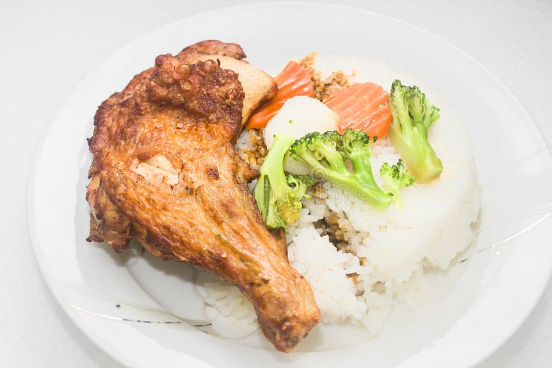 A Hong Kong Style Chicken Drumstick Rice on White Background Stock ...