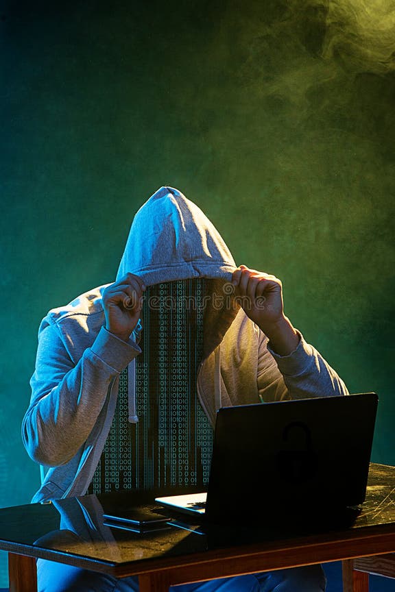 Hooded Computer Hacker Stealing Information with Laptop Stock Image ...