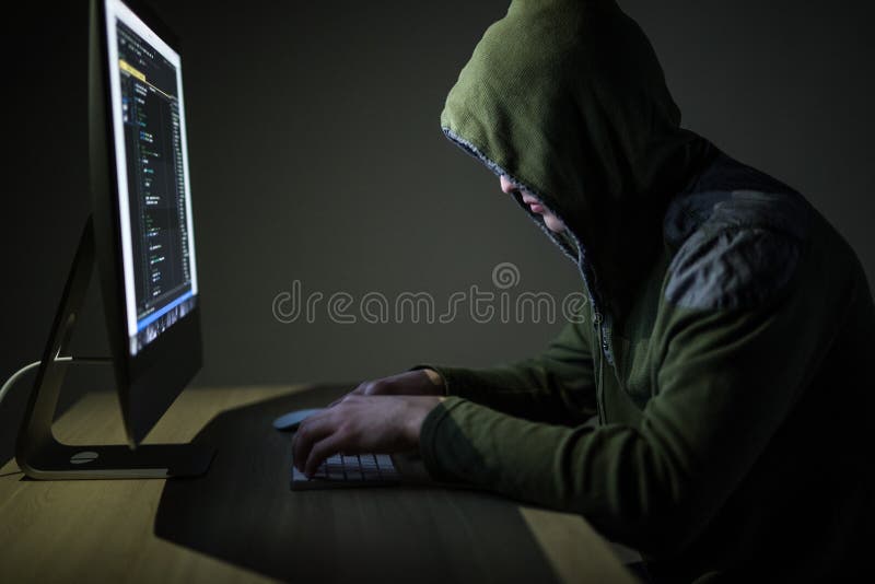 Computer Hacker in Hood Working in Dark Room Code on Pc and Hack ...