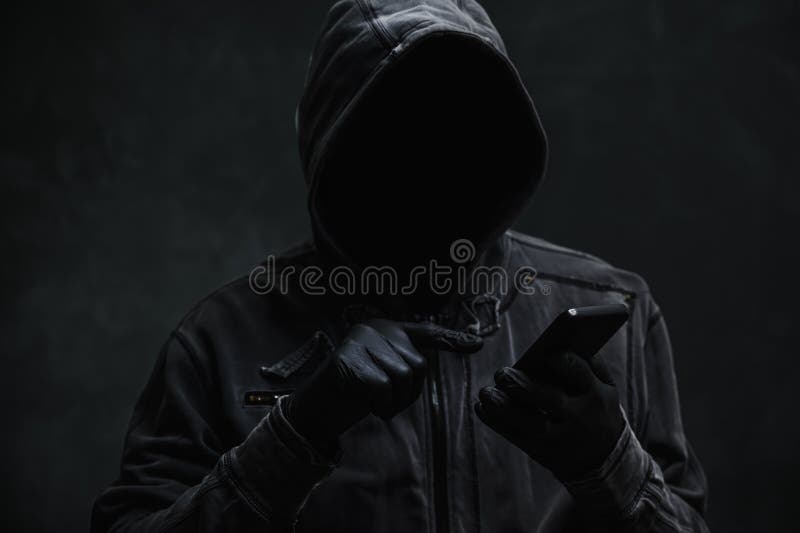 Hooded Computer Hacker Using Smartphone Stock Image - Image of computer ...