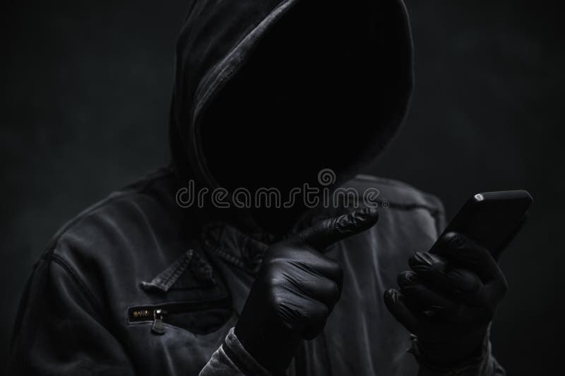 Hooded Computer Hacker Using Smartphone Stock Photo - Image of hacker, online: 365147182