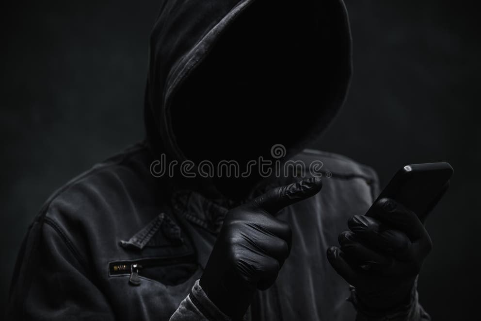 Hooded Computer Hacker Using Smartphone Stock Photo - Image of hacker, online: 365147182