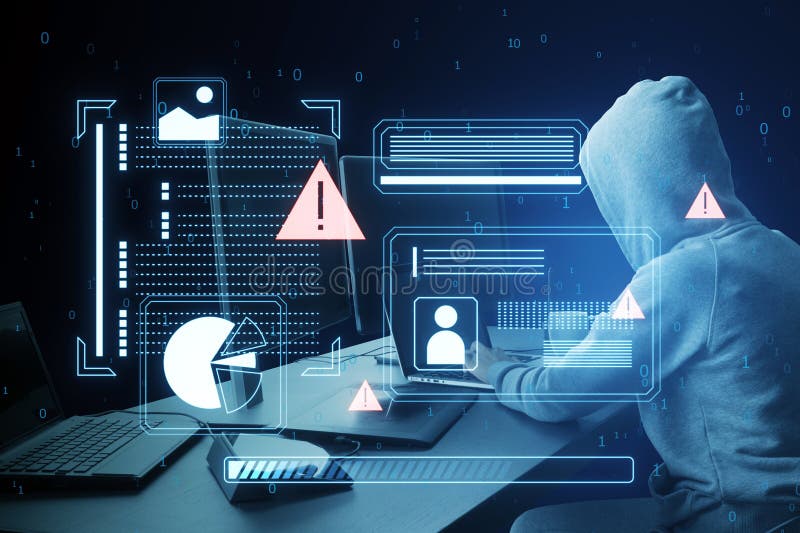 A Hooded Figure Using a Laptop with Cyber Security Graphics Overlay ...