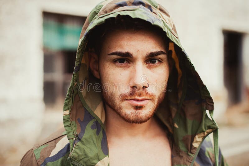 Hooded guy in the street stock image. Image of jacket - 80832307