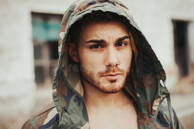 Hooded guy in the street stock image. Image of masculine - 80832355