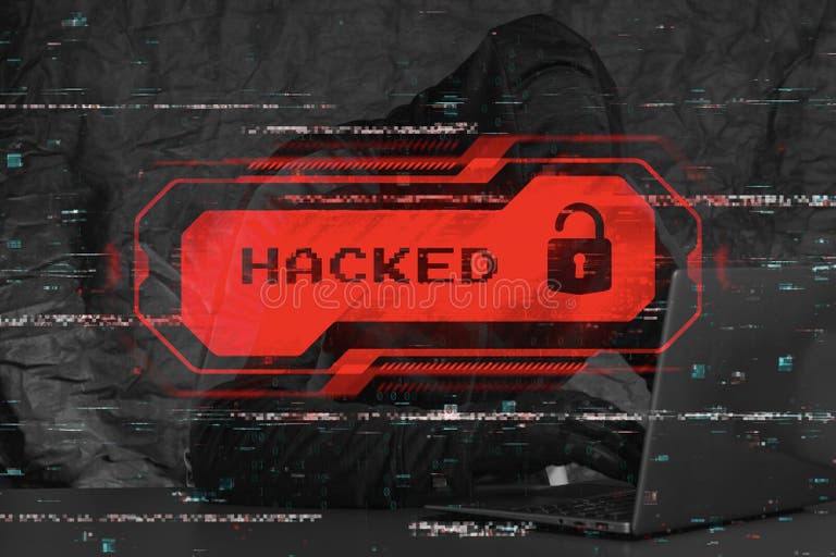 Hooded Hacker at a Laptop with a Red Glowing HACKED Warning and a ...