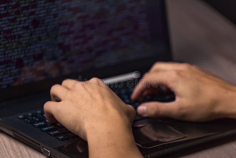 Hooded Hacker Using Laptop To Break Systems Stock Photo - Image of ... Hooded Hacker Using Laptop To Break Systems Stock Photo - Image of ...