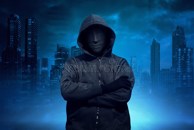 Hooded Man with Anonymous Mask Standing Stock Image - Image of ...