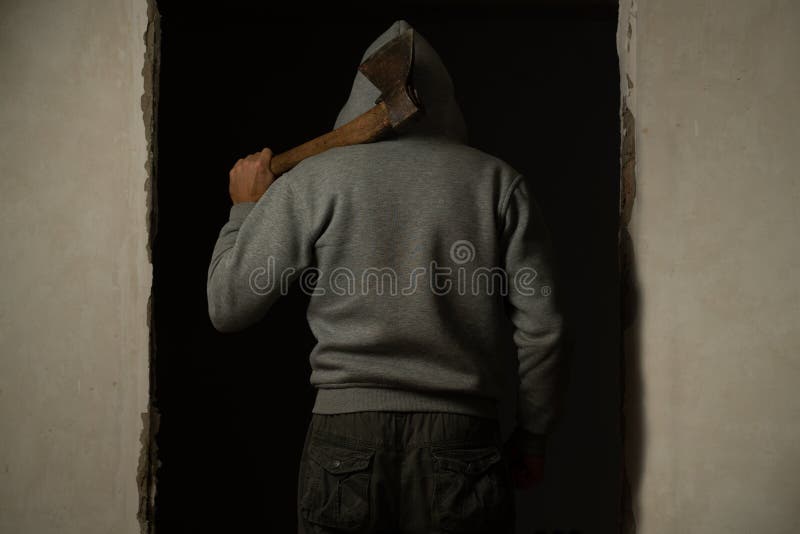 A Hooded Man with an Axe on His Shoulder Rear View Stock Image - Image ...