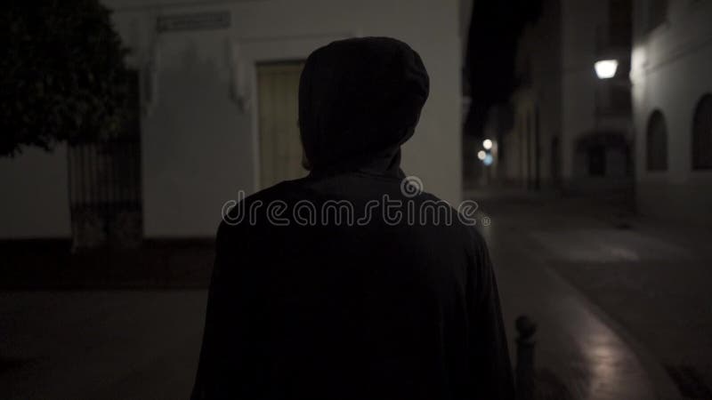 Hooded Man Walking