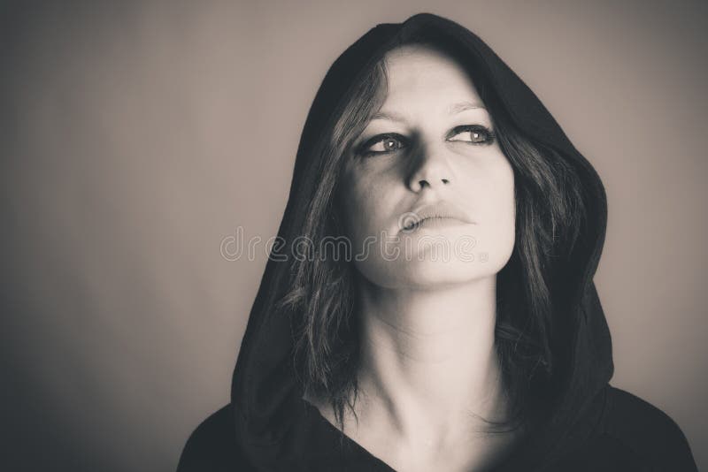 Hooded scheming woman stock photo. Image of glance, beautiful - 56102944