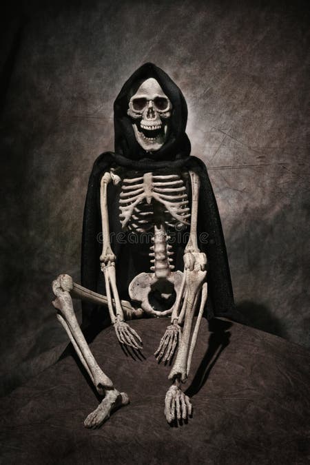 Hooded skeleton in robe stock photo. Image of hooded - 21818374