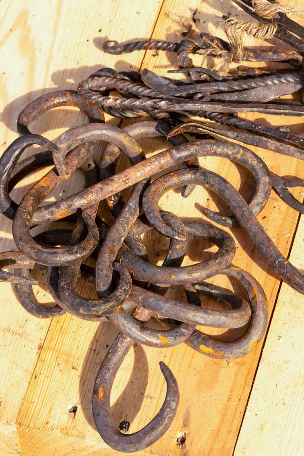 Hook Iron Old Rusty Many Close Up Vertical Photo on Wooden Background ...