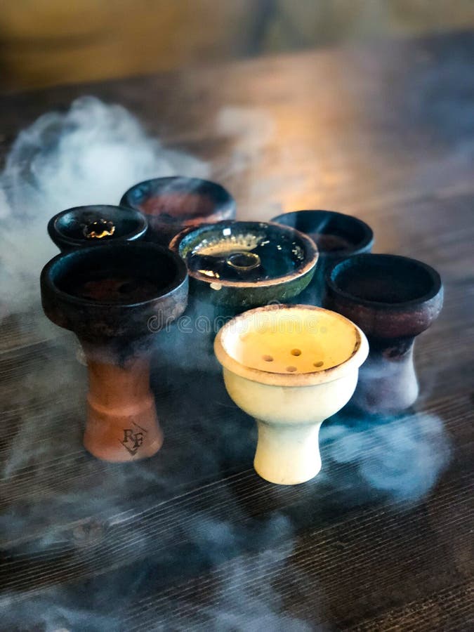 Hookah bowl in smoke stock photo. Image of table, hookah - 233183008