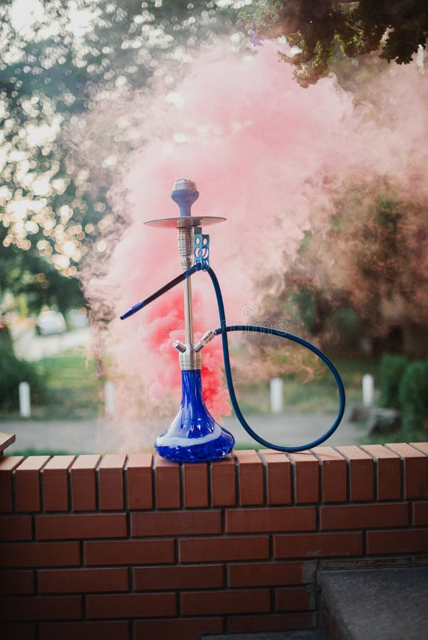 Hookah Outdoors on a Background of Colored Smoke Stock Image - Image of ...